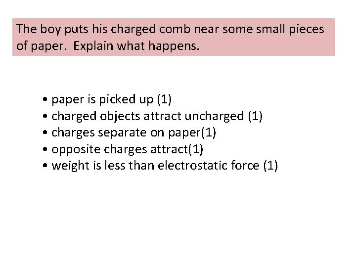 A boy combs his hair using a plastic